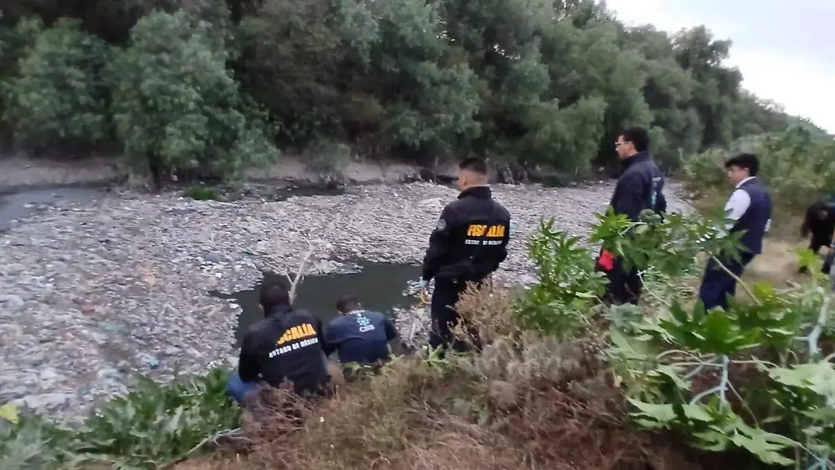 Hallan cuerpo de mujer embarazada en canal de aguas negras en ...